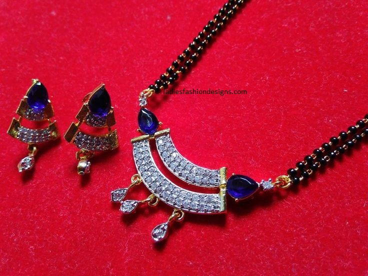 Traditional diamond black bead mangalasutra heavy locket designs ...